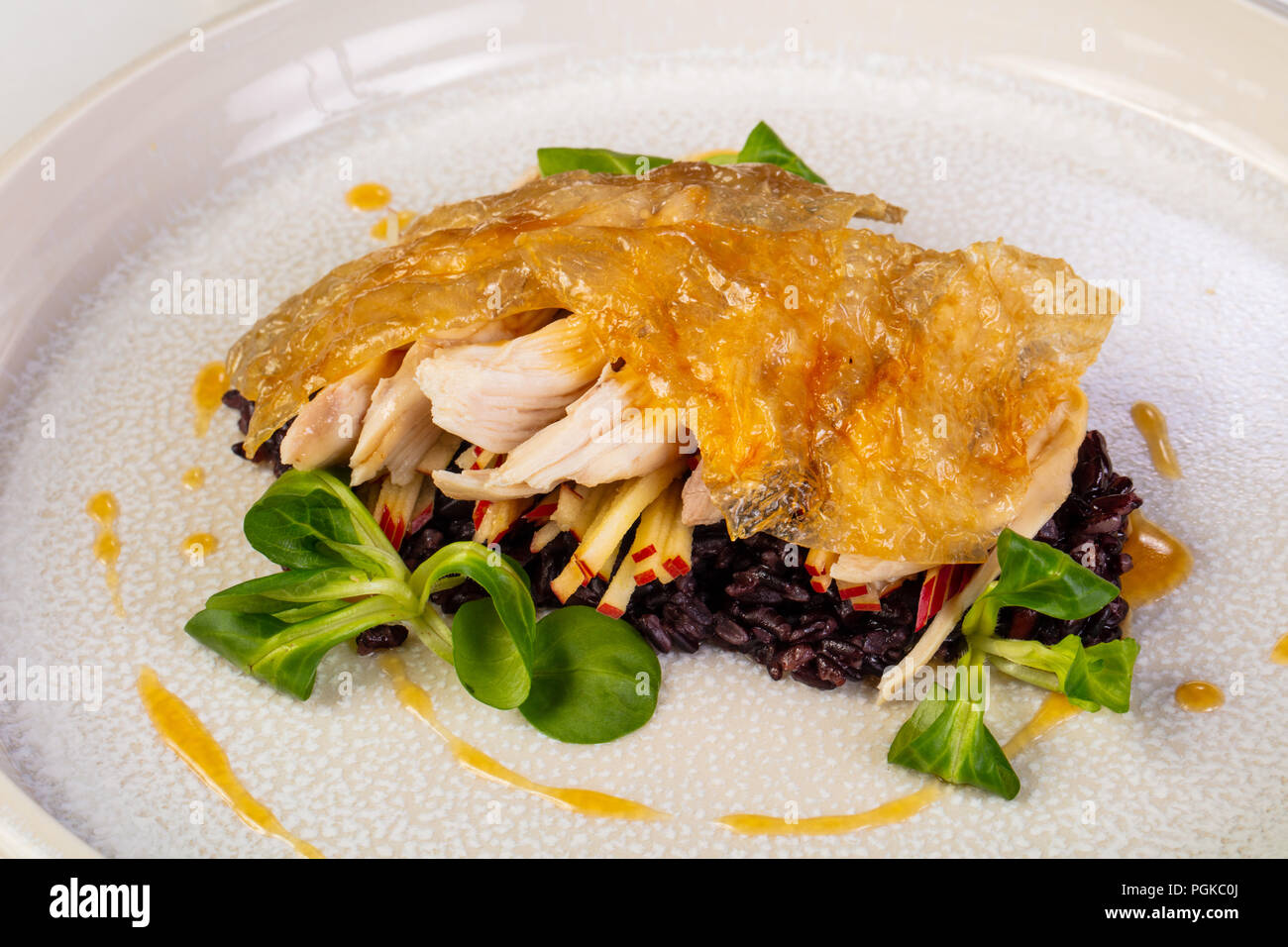 Guinea fowl with wild rice Stock Photo - Alamy