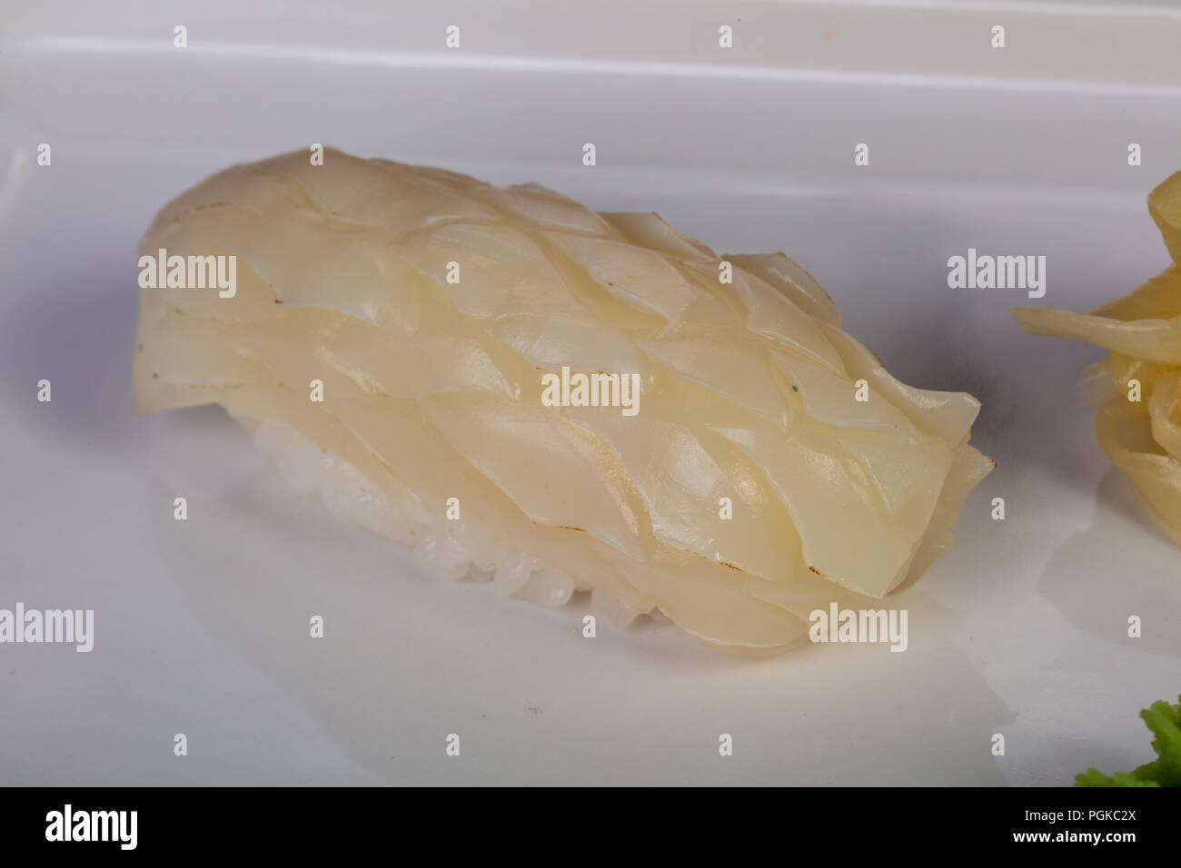 Japanese cold sushi with squid Stock Photo - Alamy