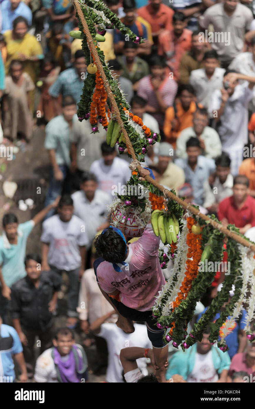 Dahi Handi festival to celebrate God Krishna's Birth in Mumbai India. A ...