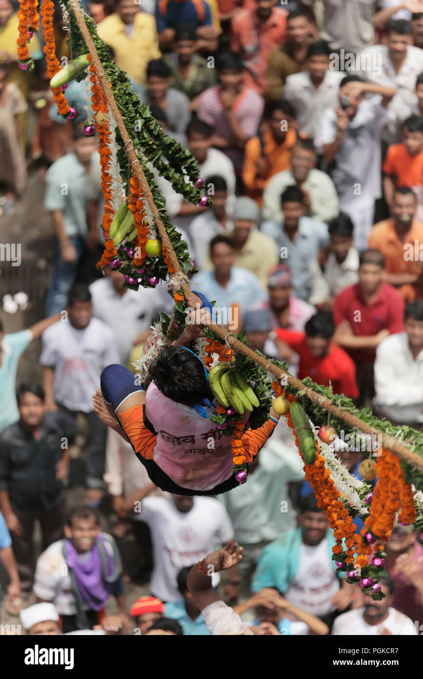 Dahi Handi festival to celebrate God Krishna's Birth in Mumbai India. A ...