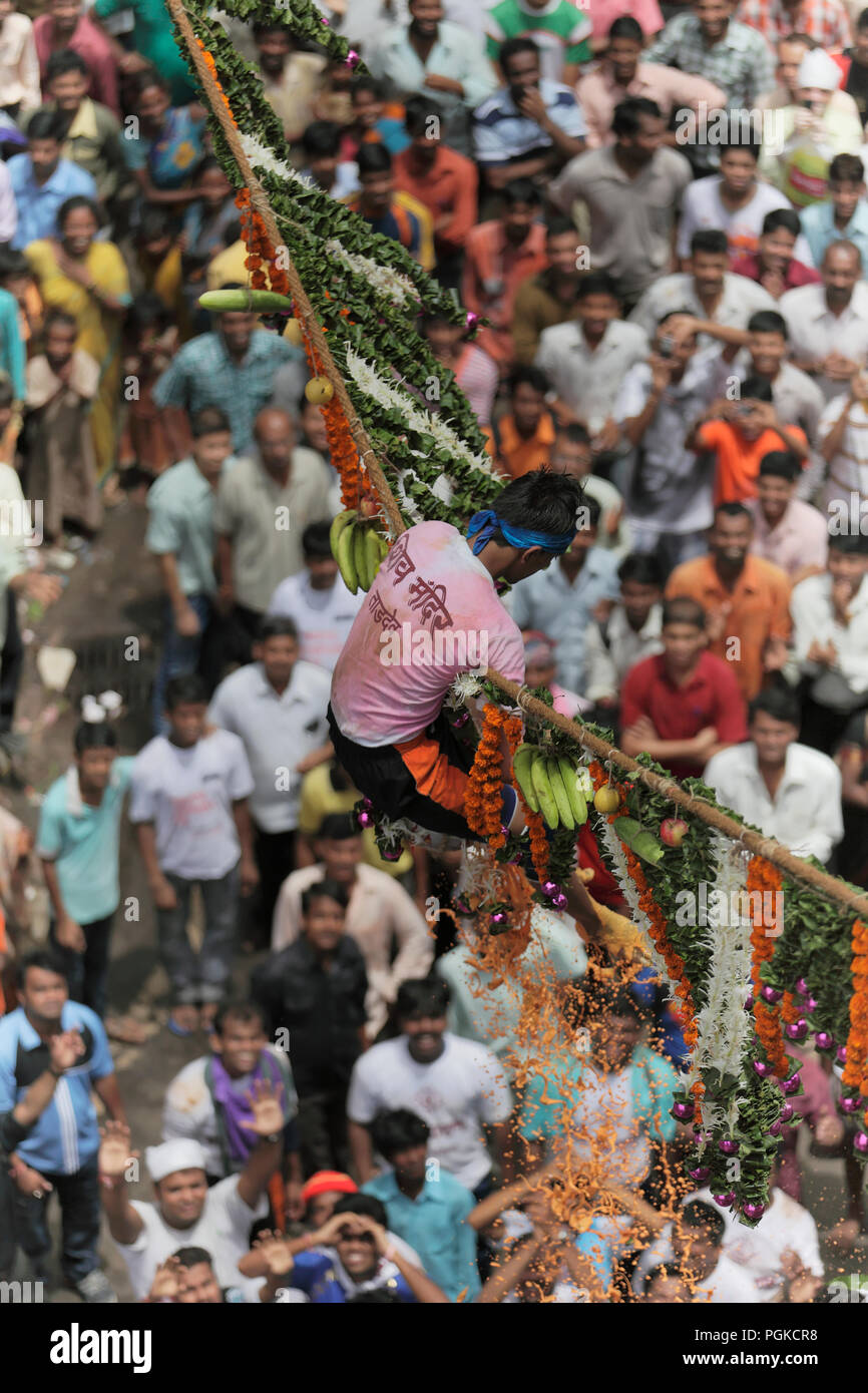 Dahi Handi festival to celebrate God Krishna's Birth in Mumbai India. A ...