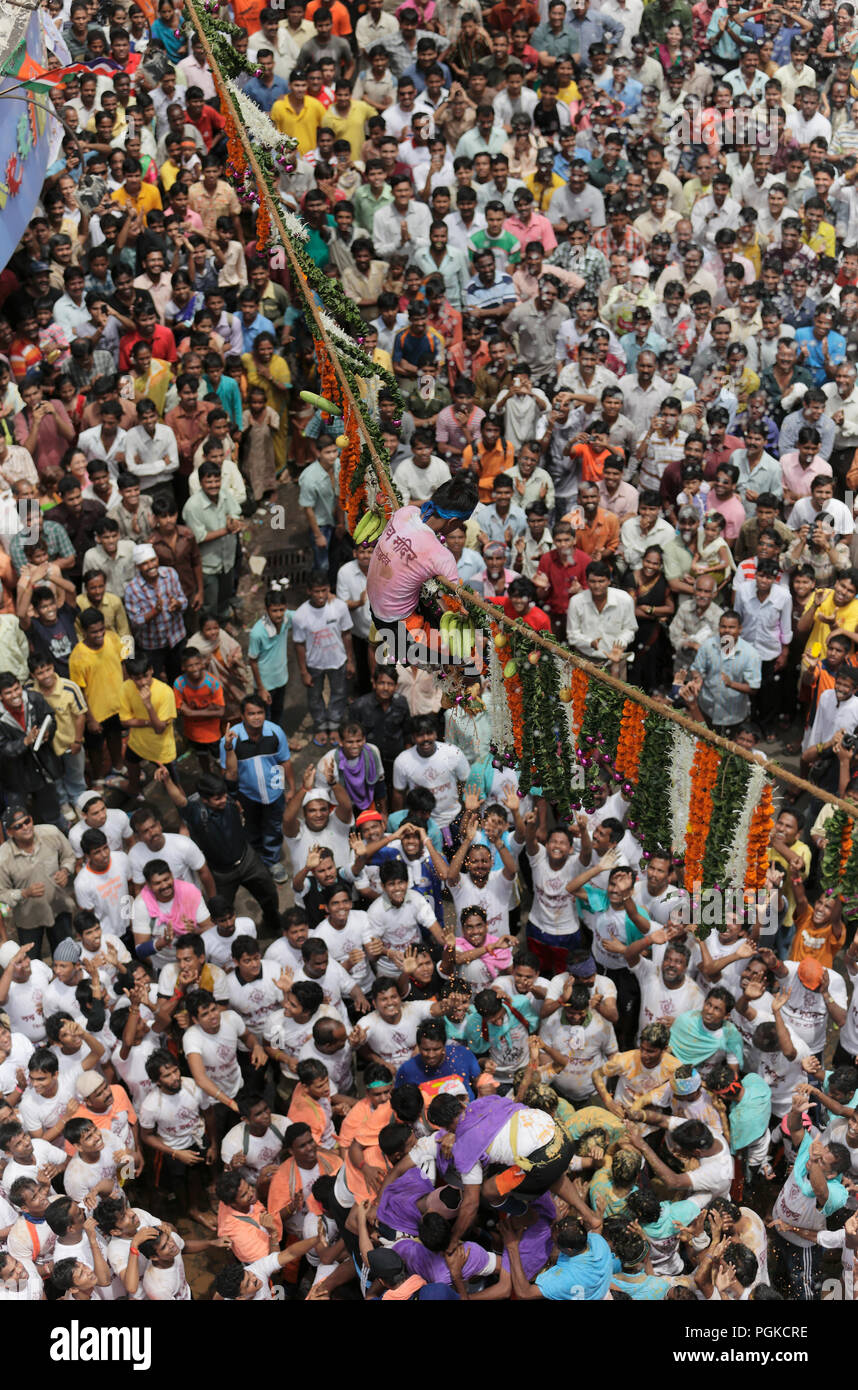 Dahi Handi festival to celebrate God Krishna's Birth in Mumbai India. A ...