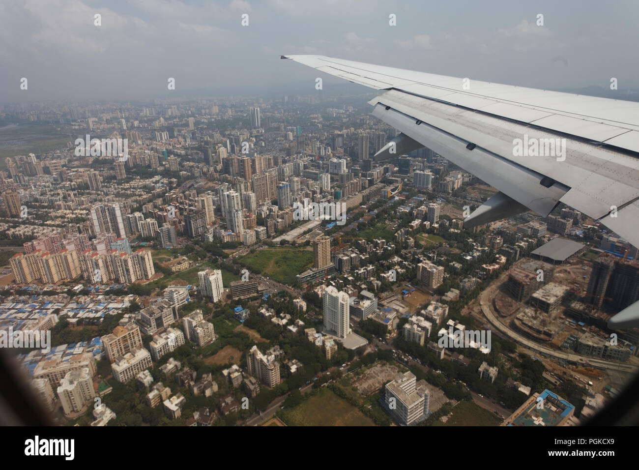 view of Mumbai, from plane window after take off from Mumbai airport ...