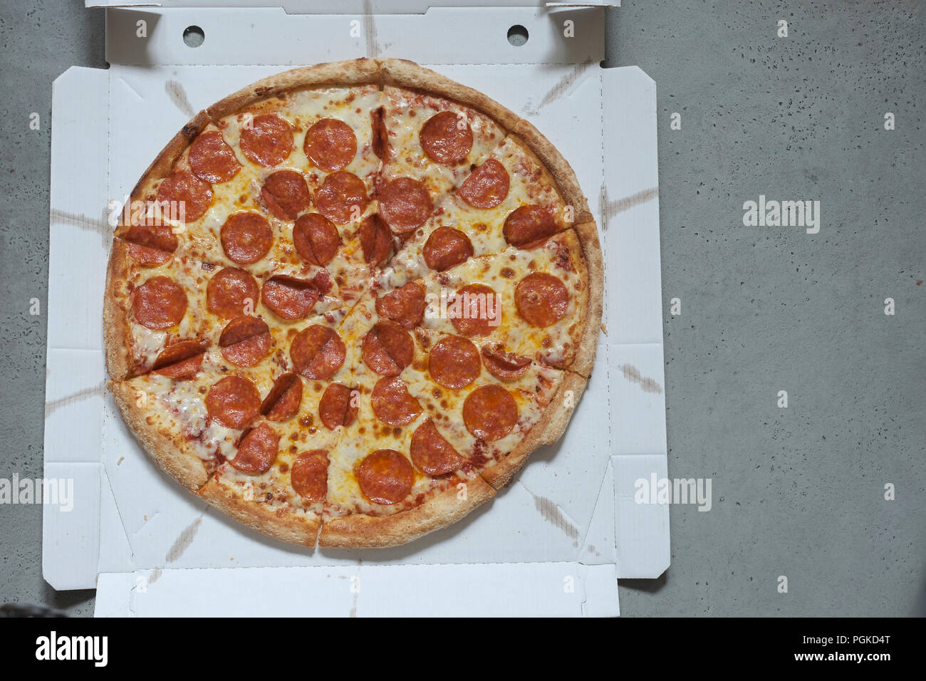Pepperoni Pizza in Delivery Box Stock Photo - Alamy