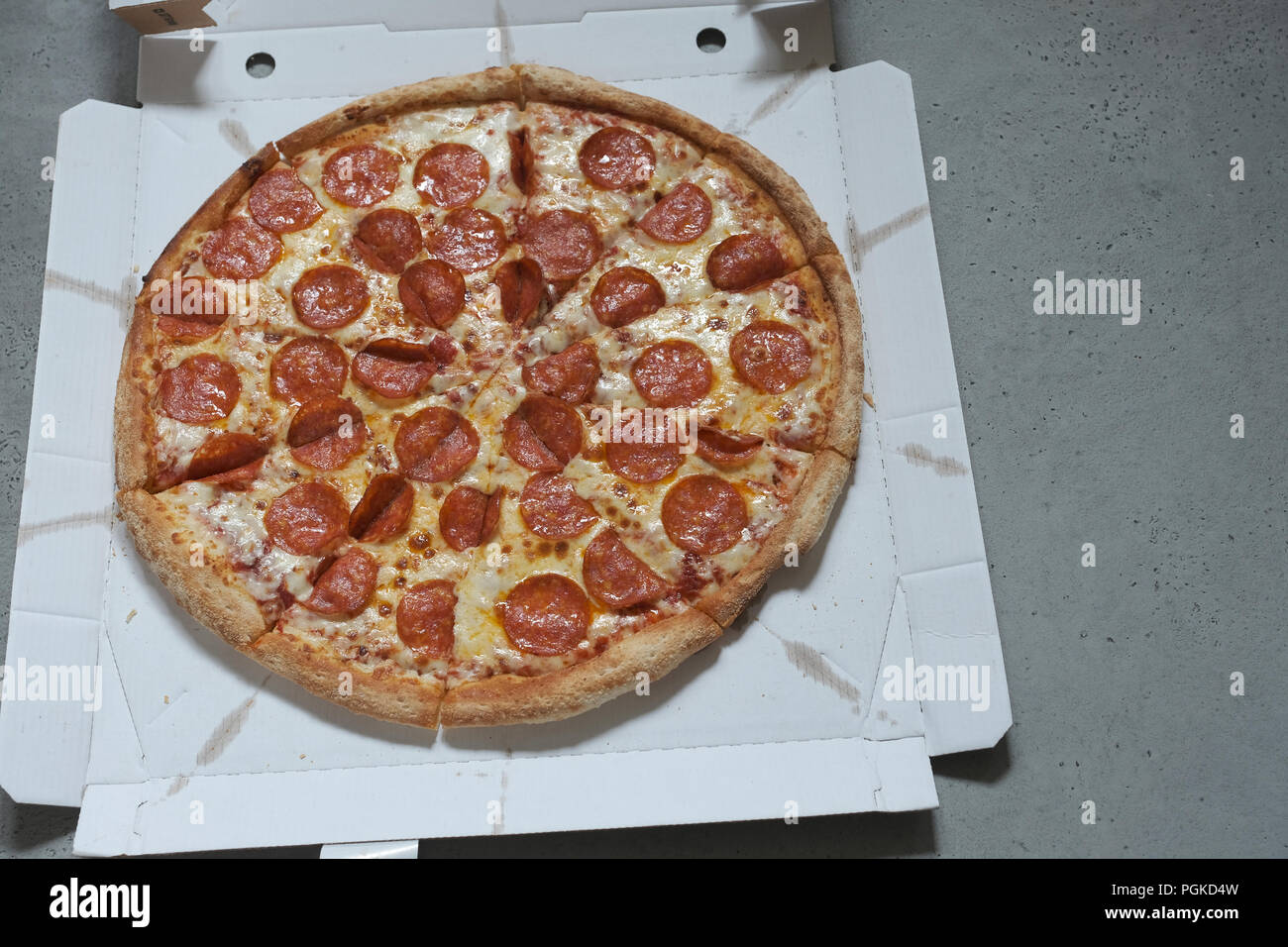 Pepperoni Pizza in Delivery Box Stock Photo - Alamy
