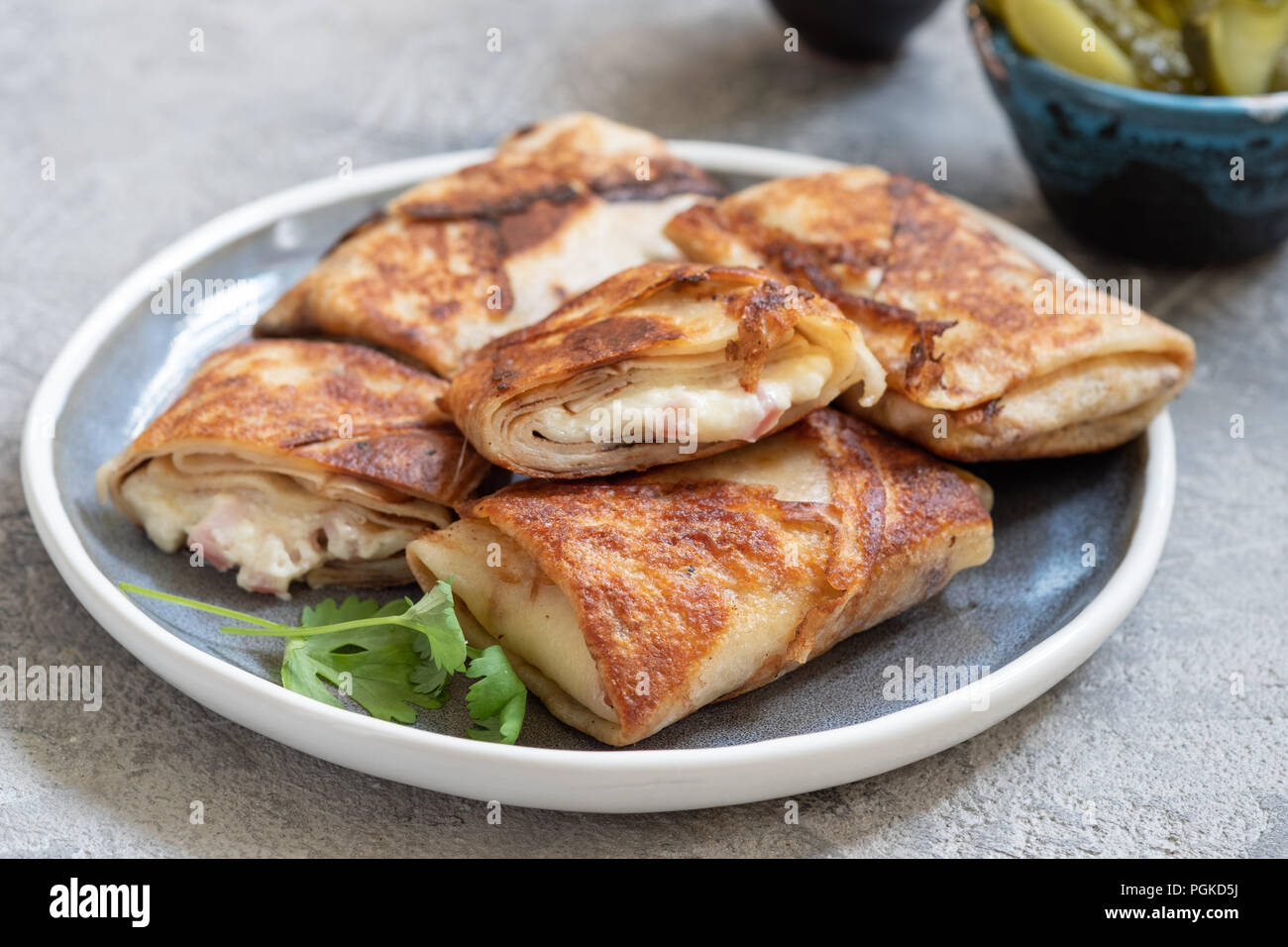 Crepes with ham and cheese Stock Photo - Alamy