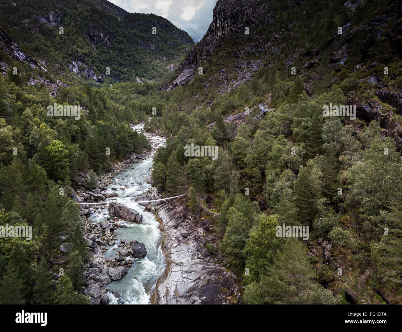 Stream through the mountains Stock Photo - Alamy