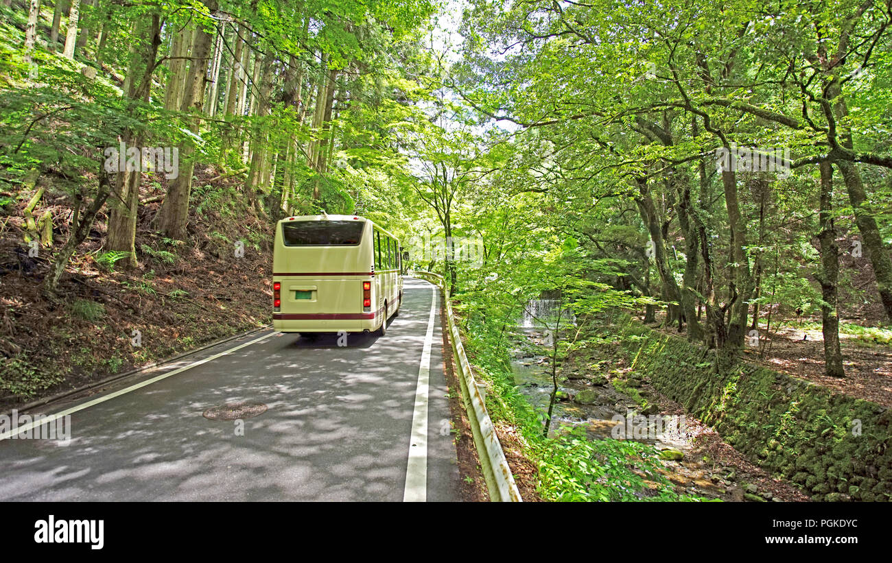 The going up bus to on the road path of the countryside mountain Stock ...