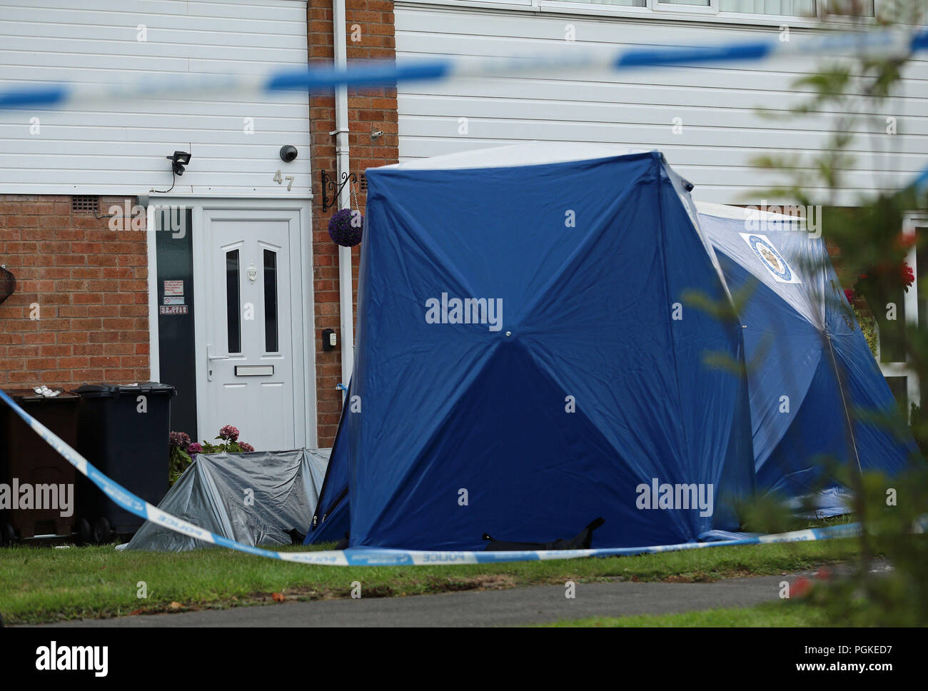 Police forensic tents outside a property on Northdown Road in Solihull ...