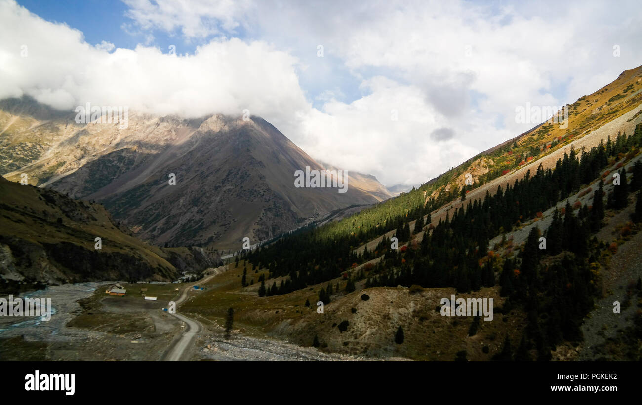 serpentine road to Barskoon pass, river and gorge and Sarymoynak pass ...