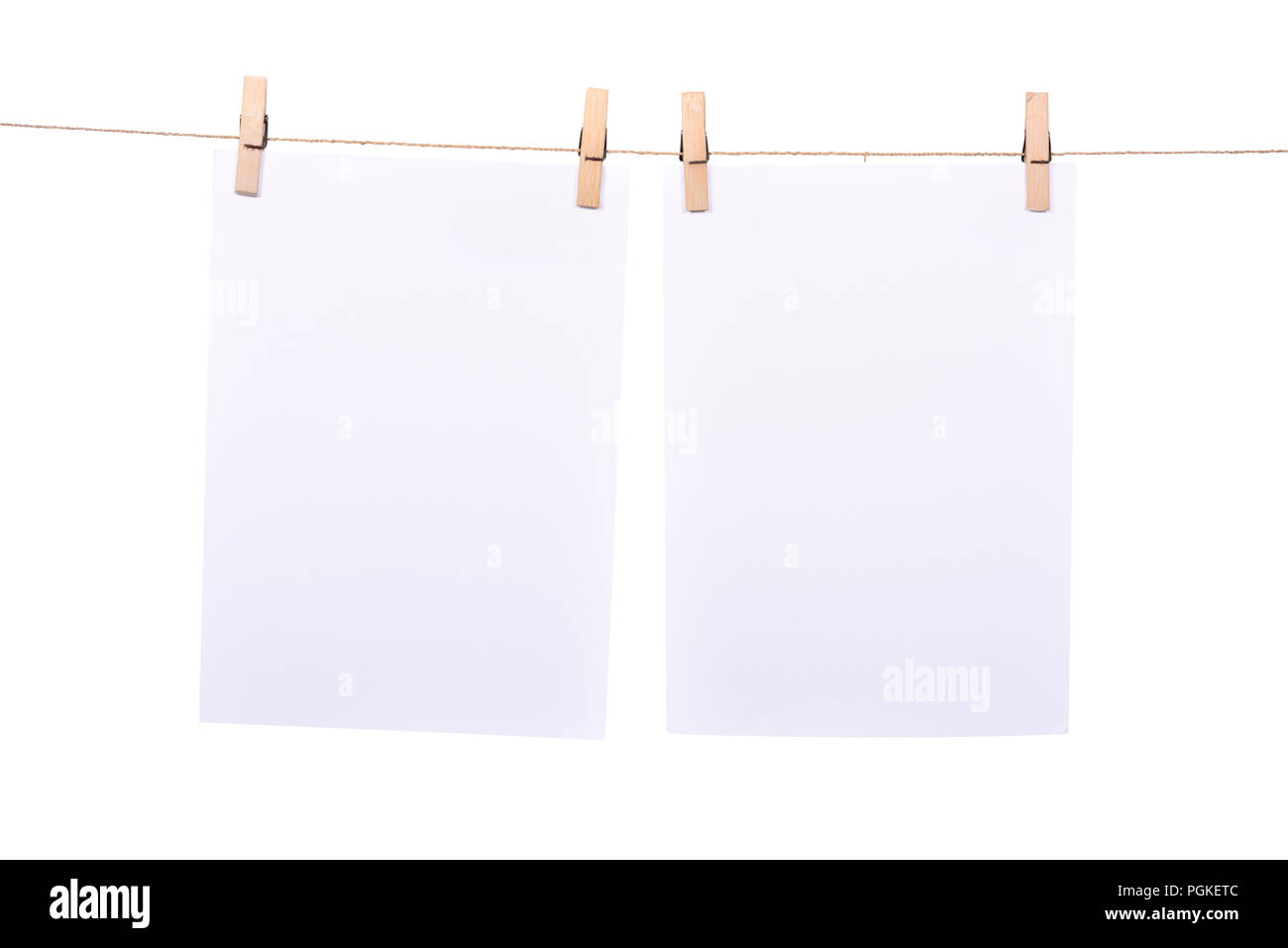 Two paper sheet hanging on rope isolated over white background Stock ...