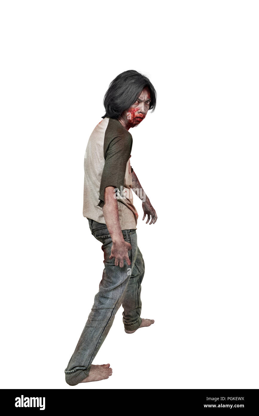 Rear view of zombie man with bloody mouth standing isolated over white ...