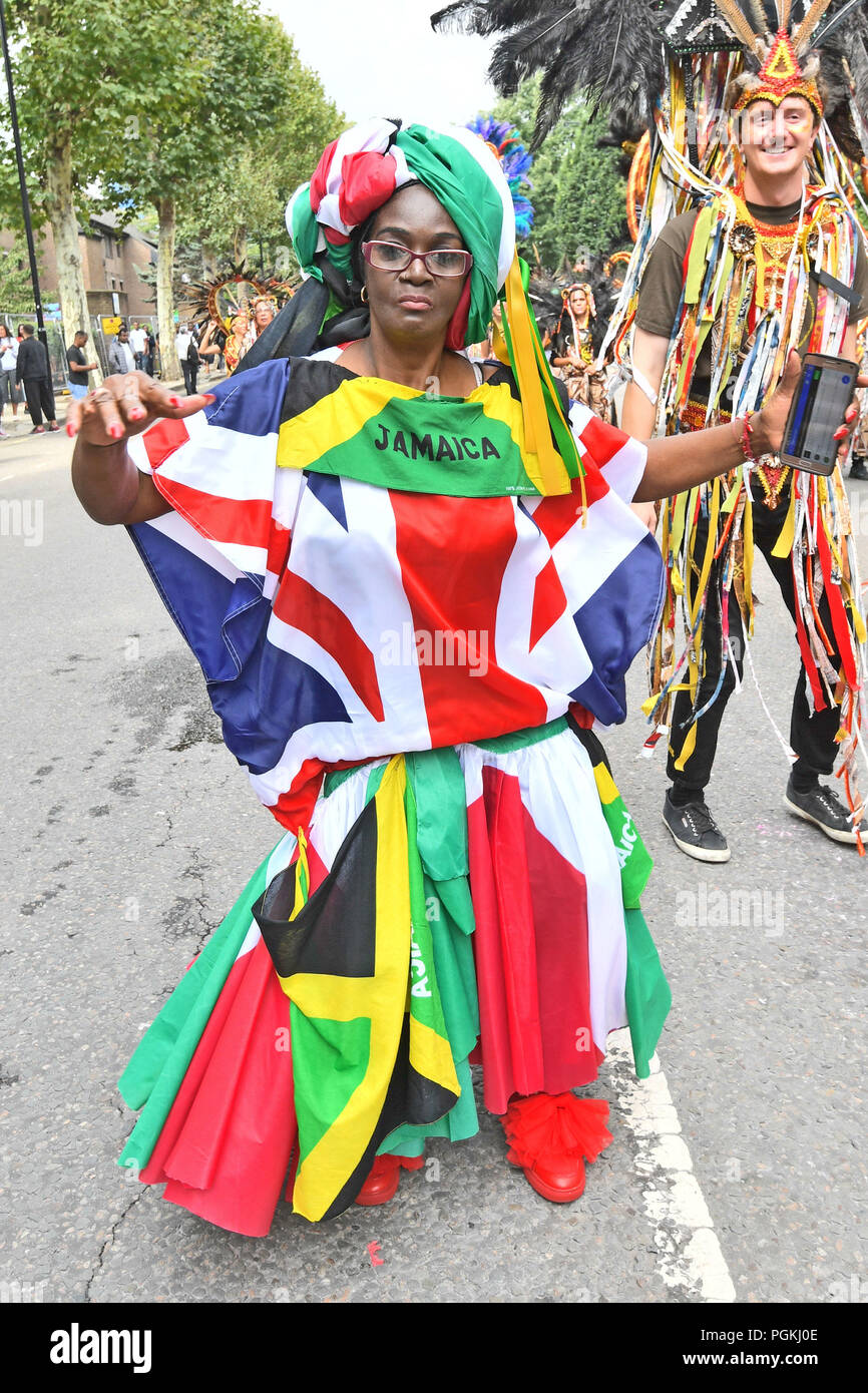 A dancer takes part in the Notting Hill Carnival in west London Stock ...
