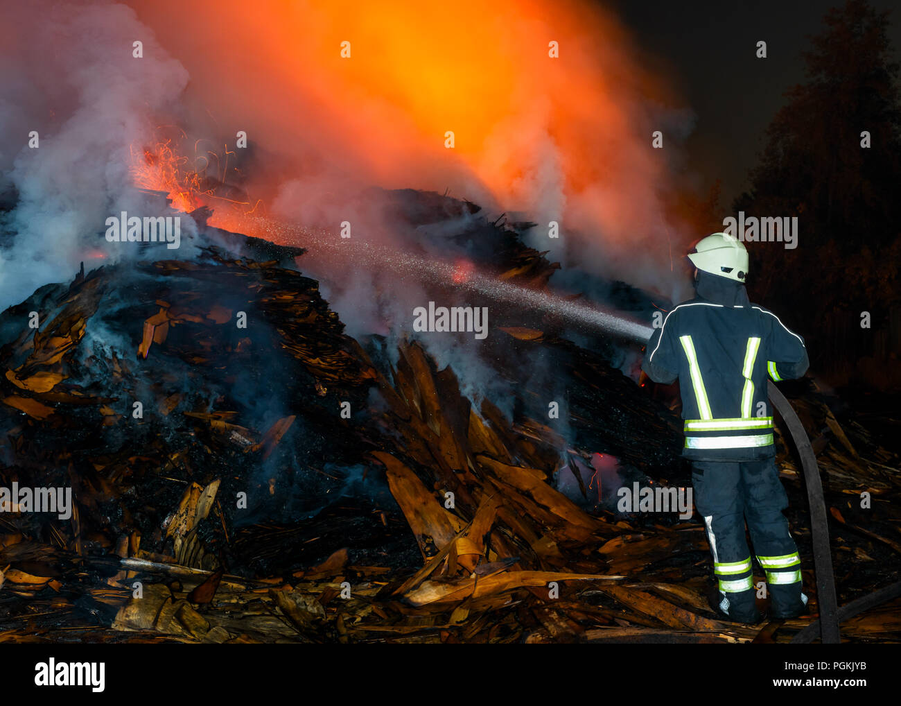 firefighters at night Stock Photo - Alamy