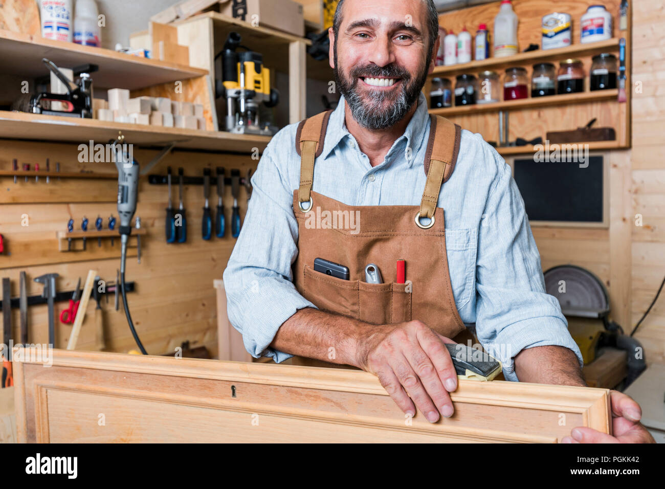 caucasian carpenter at work in a workshop Stock Photo - Alamy