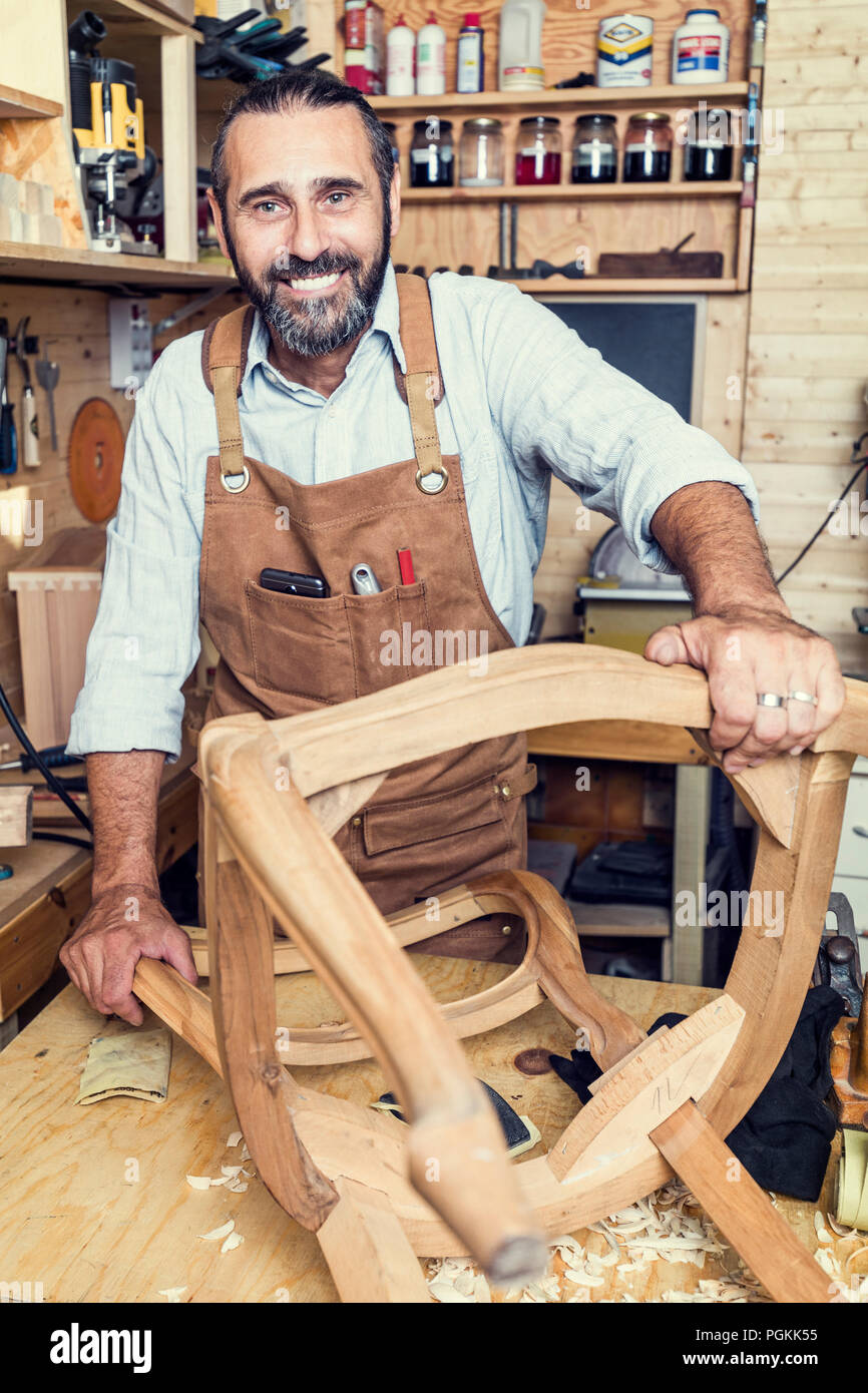 caucasian carpenter at work in a workshop Stock Photo - Alamy