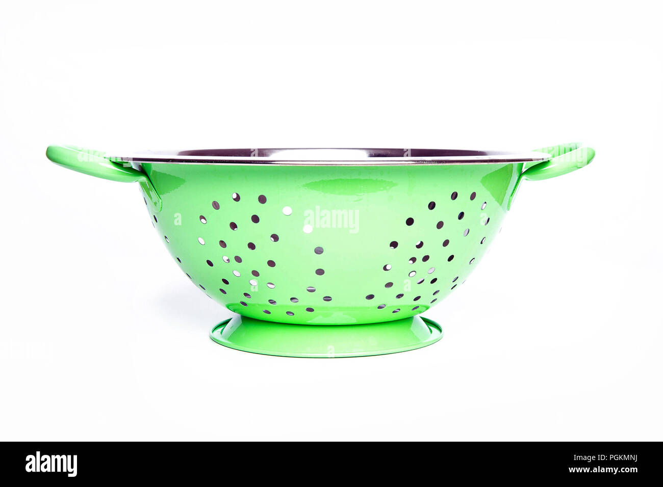 Green colander isolated on white background Stock Photo - Alamy