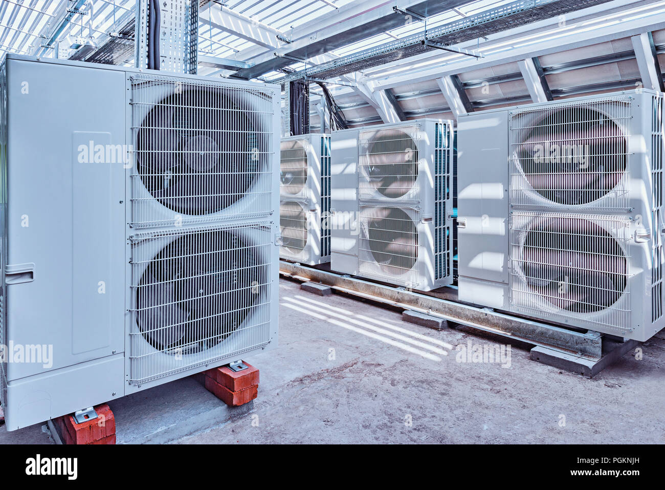 Air conditioning system assembled and installed on top of the building ...