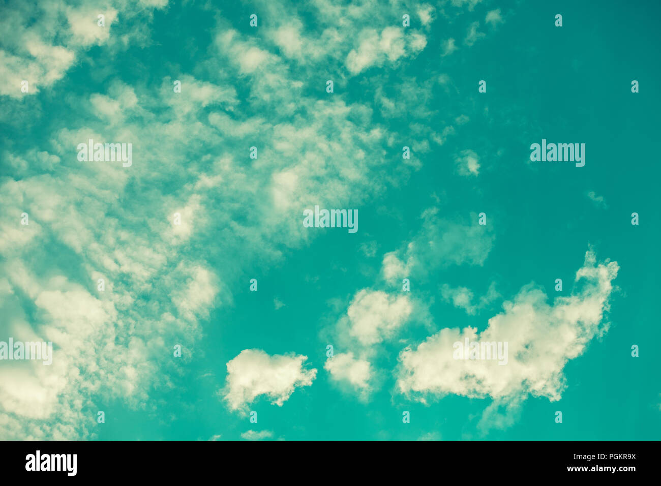 Natural background. Cold green colored sky with clouds Stock Photo - Alamy