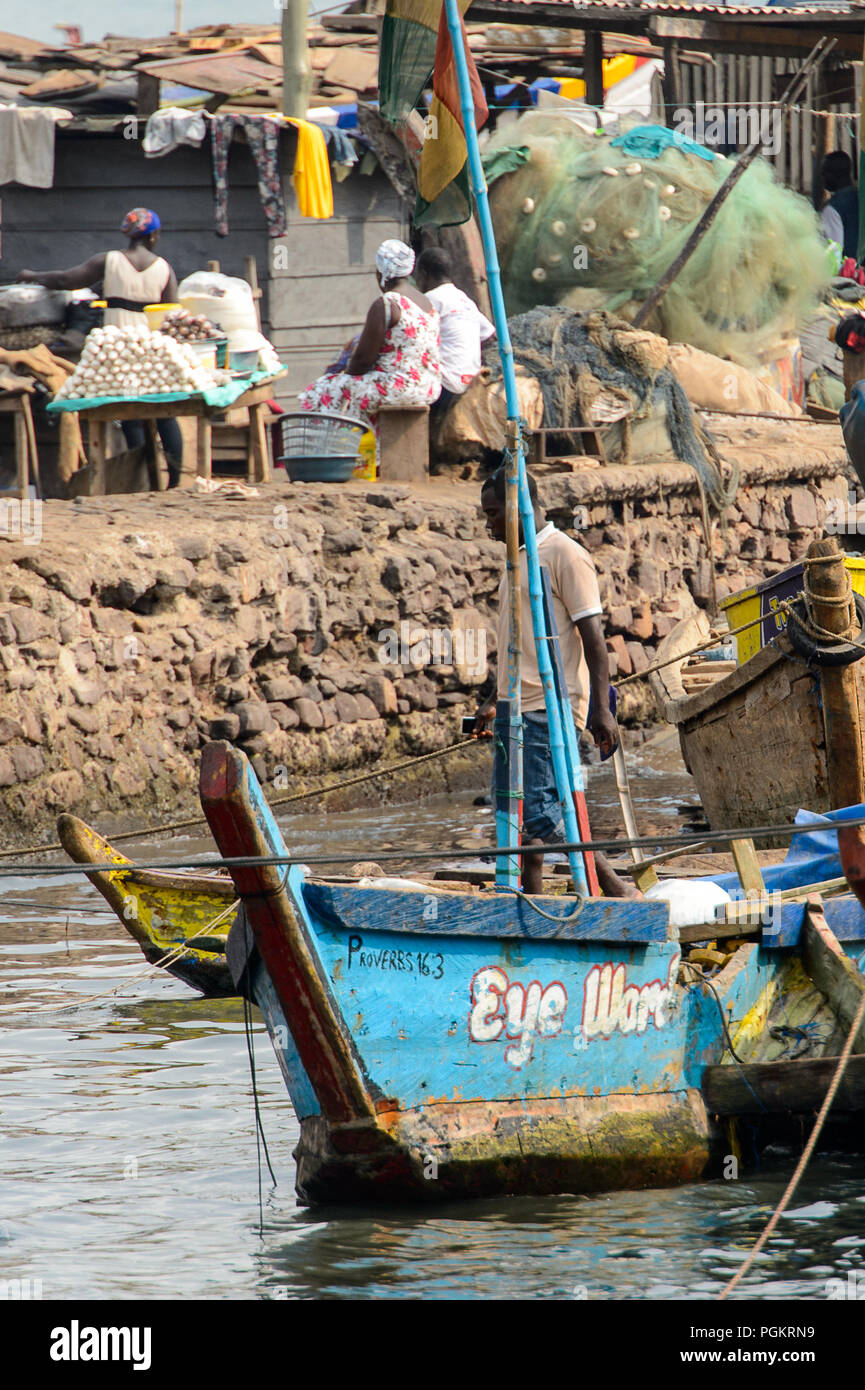 ELMINA, GHANA -JAN 18, 2017: Unidentified Ghanaian men sail on boat in ...