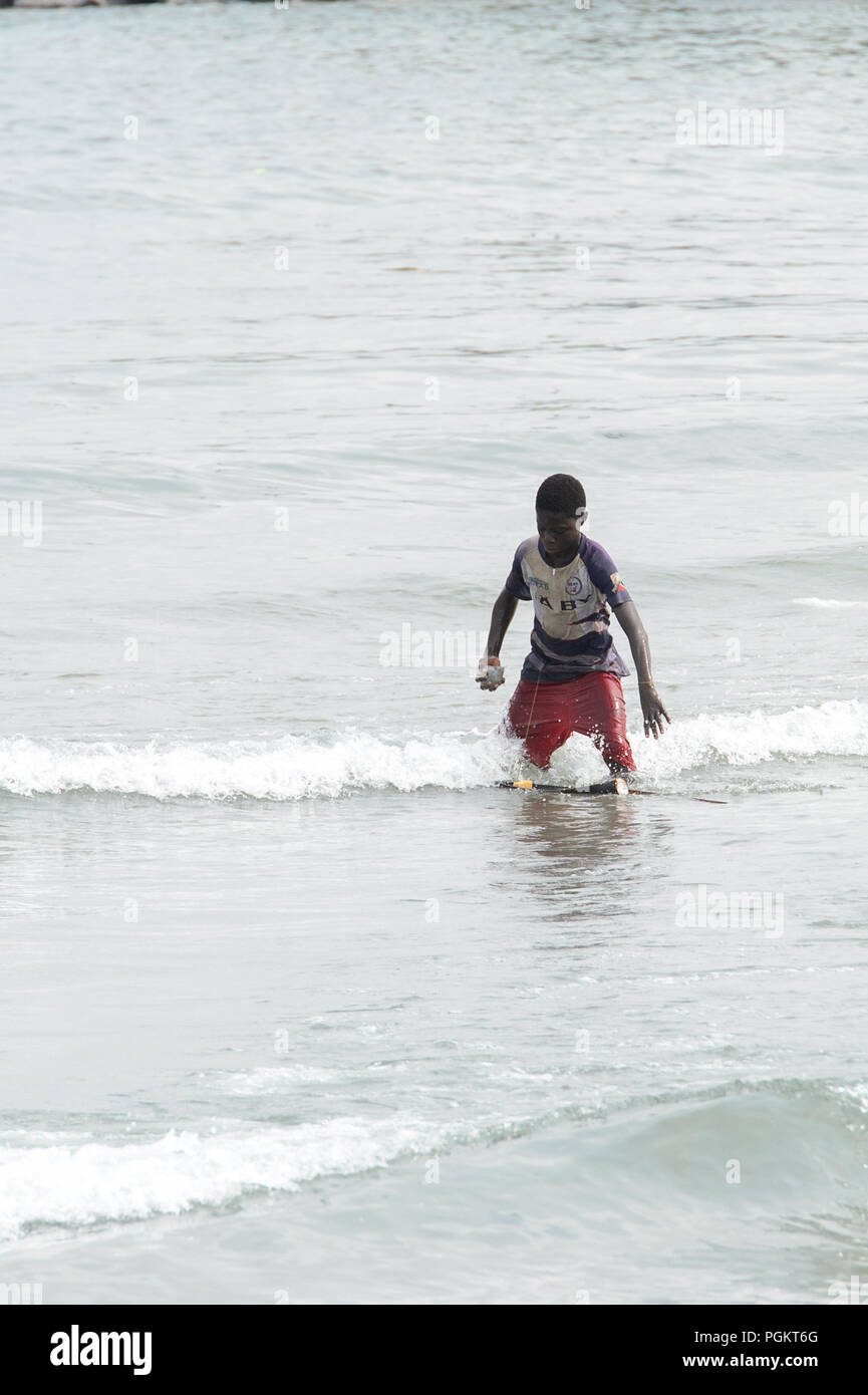 ELMINA, GHANA -JAN 18, 2017: Unidentified Ghanaian little boy swims in ...
