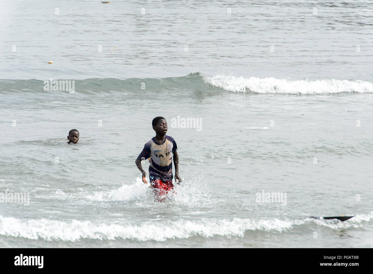 ELMINA, GHANA -JAN 18, 2017: Unidentified Ghanaian little boy swims in ...