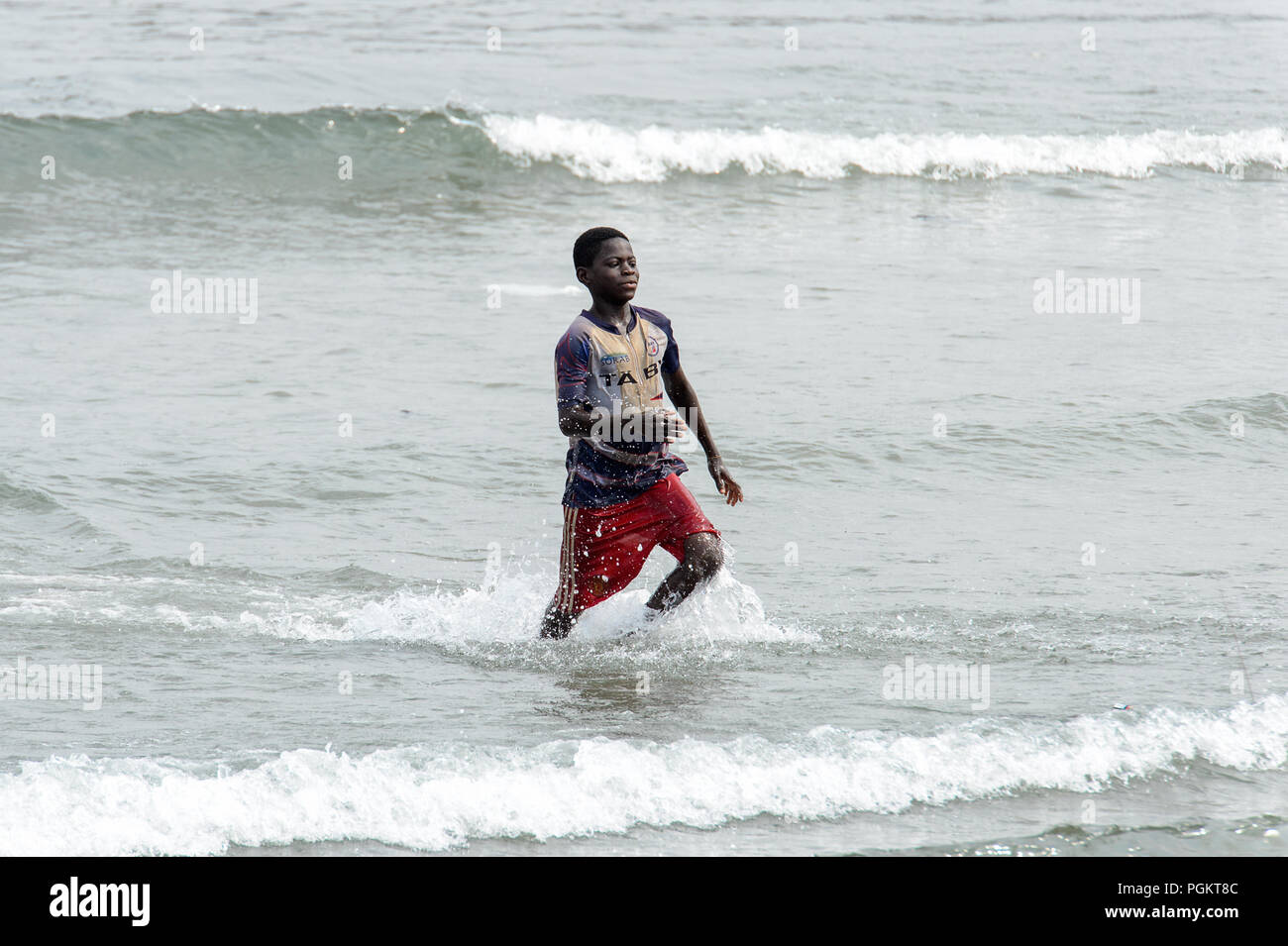 ELMINA, GHANA -JAN 18, 2017: Unidentified Ghanaian little boy swims in ...