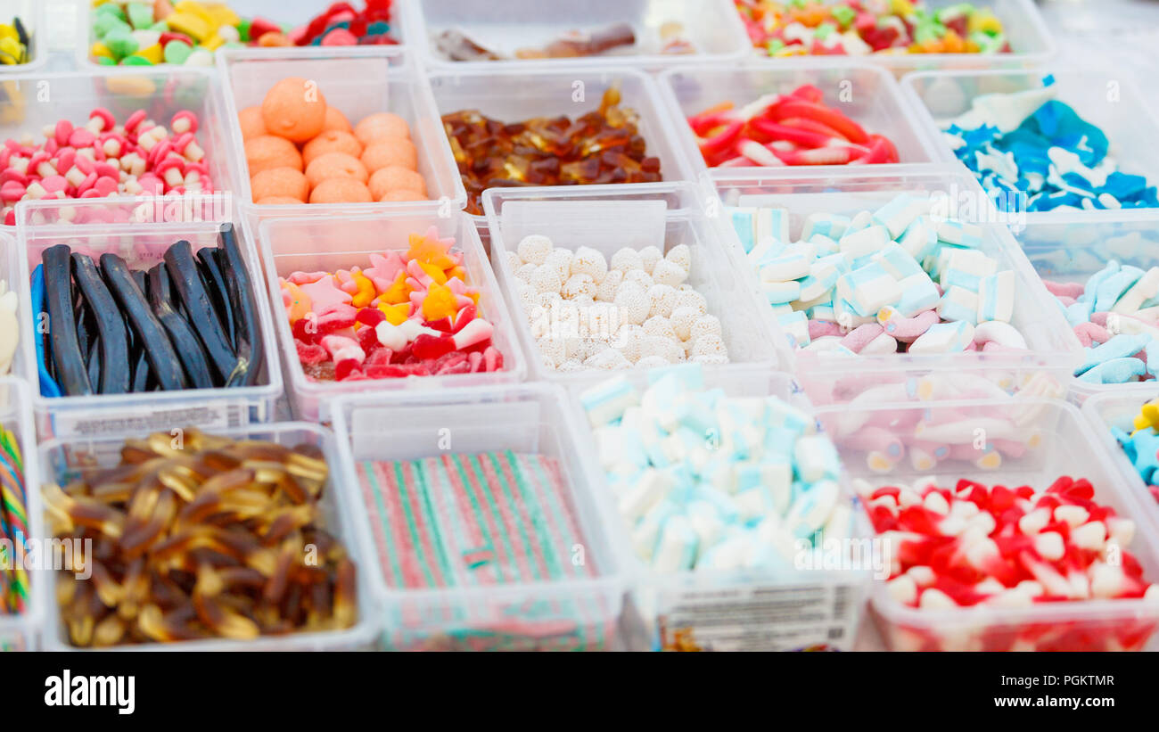 Sweet display on a market Stock Photo - Alamy