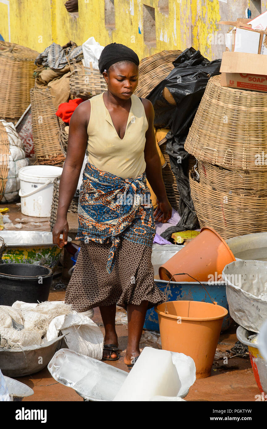 ELMINA, GHANA -JAN 18, 2017: Unidentified Ghanaian woman walks along ...