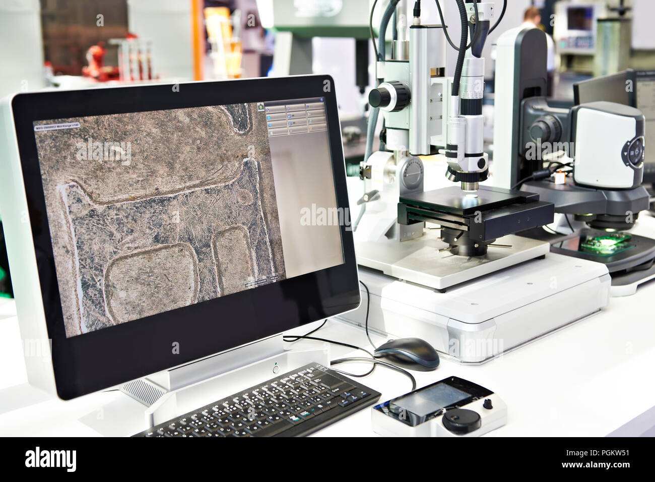 Digital microscope and monitor in the laboratory Stock Photo - Alamy