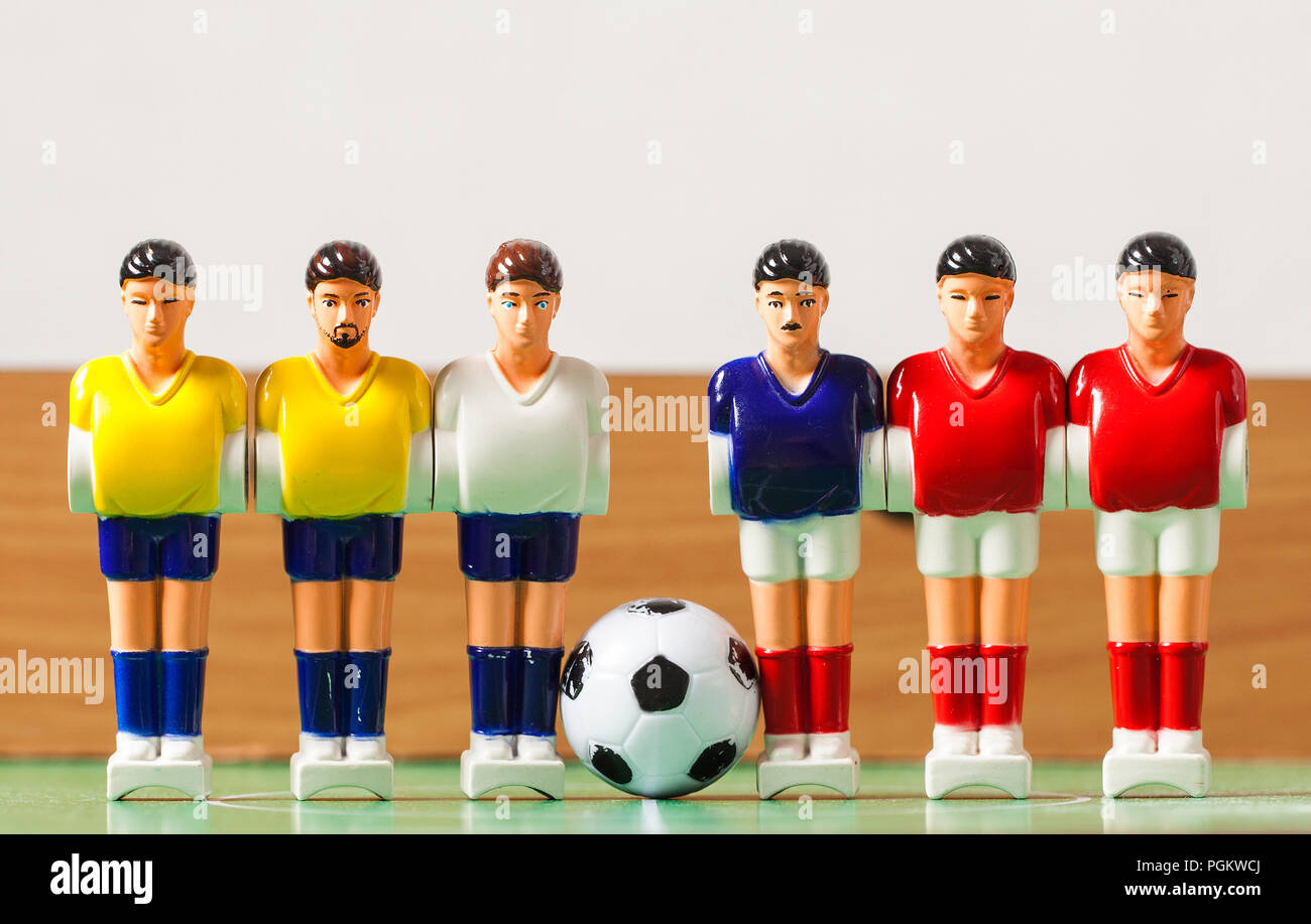 football players foosball Stock Photo - Alamy