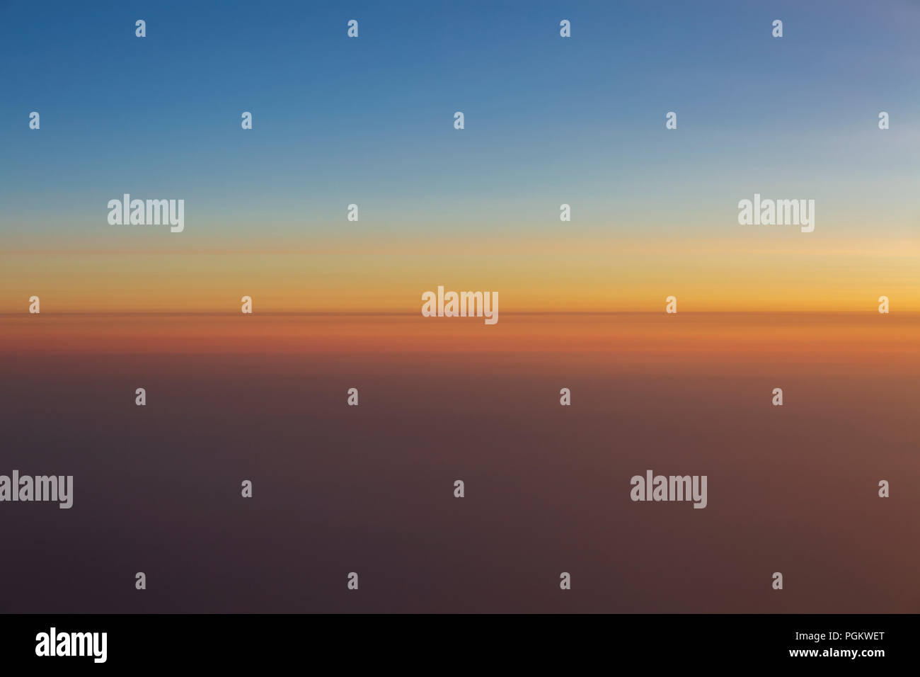 Sunset sky view from airplane window. Sunset in the sky Stock Photo - Alamy