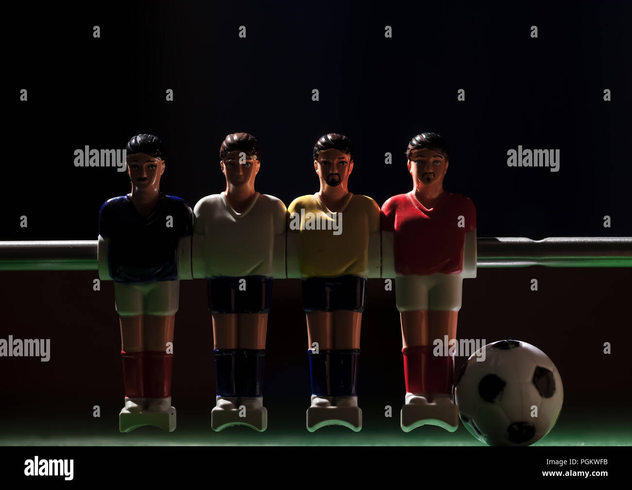 football players foosball Stock Photo - Alamy