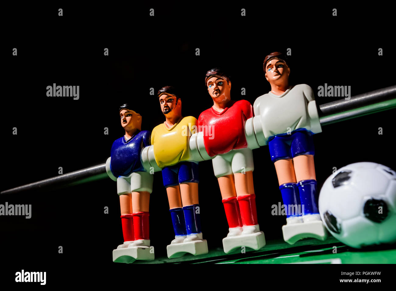 football players foosball Stock Photo - Alamy