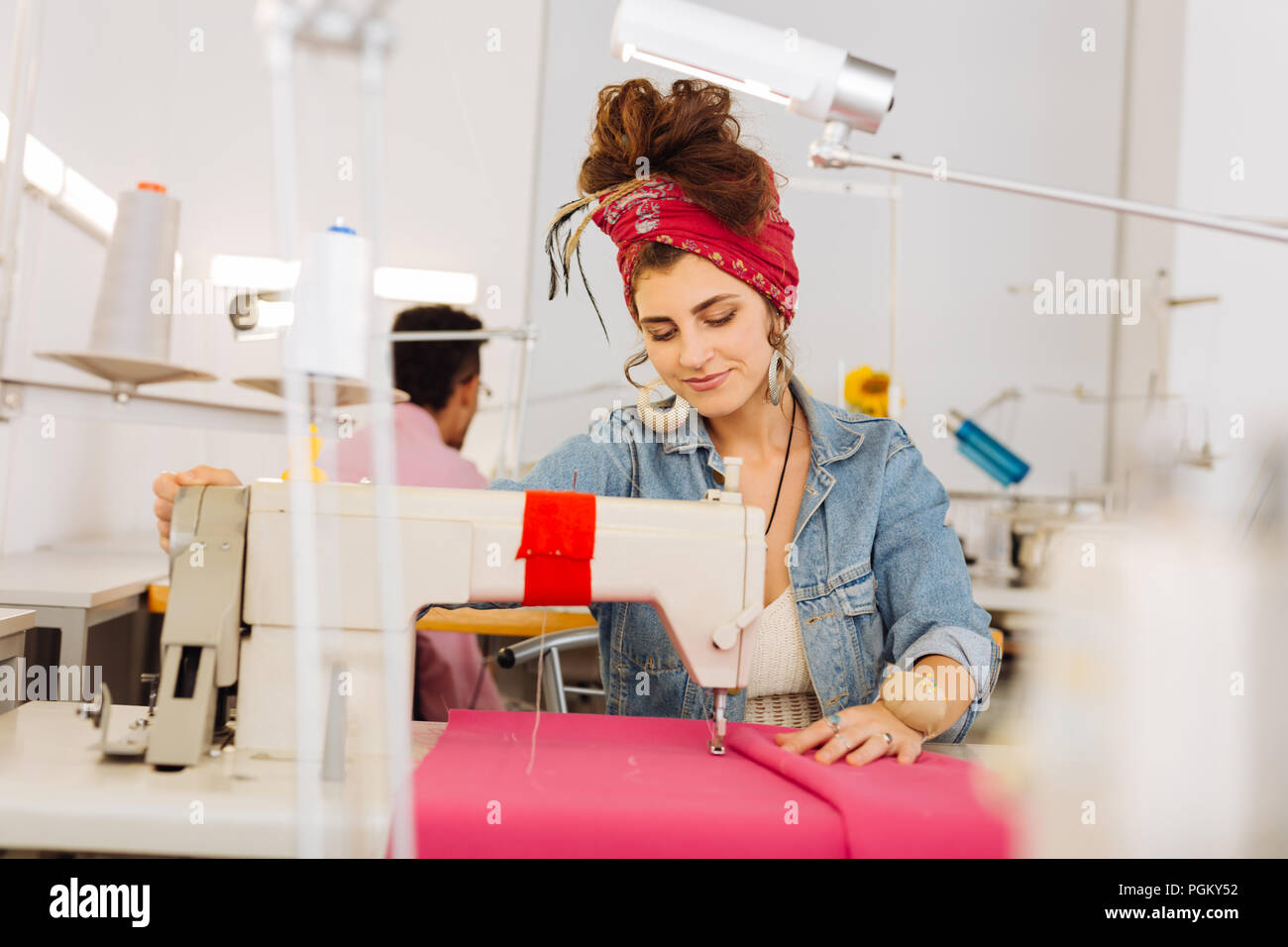 Woman sewing machine pink hi-res stock photography and images - Alamy