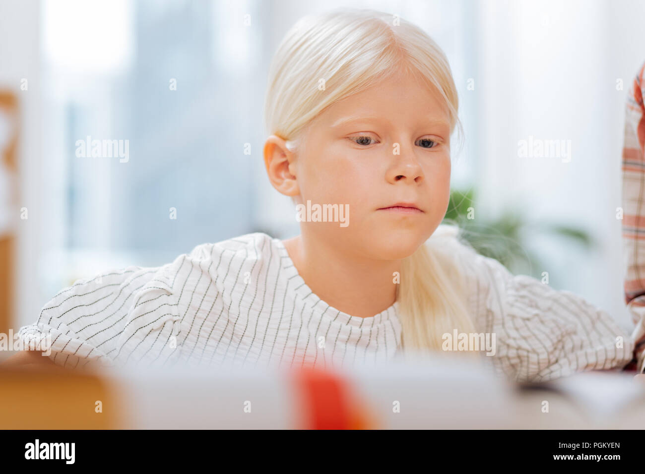 Thoughtful schoolgirl hi-res stock photography and images - Alamy