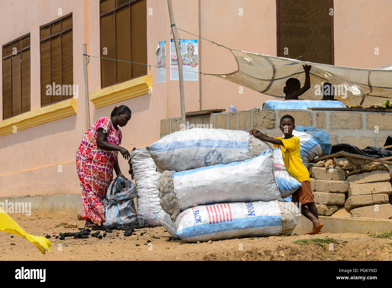 CENTRAL REGION, GHANA - Jan 17, 2017: Unidentified Ghanaian woman holds ...