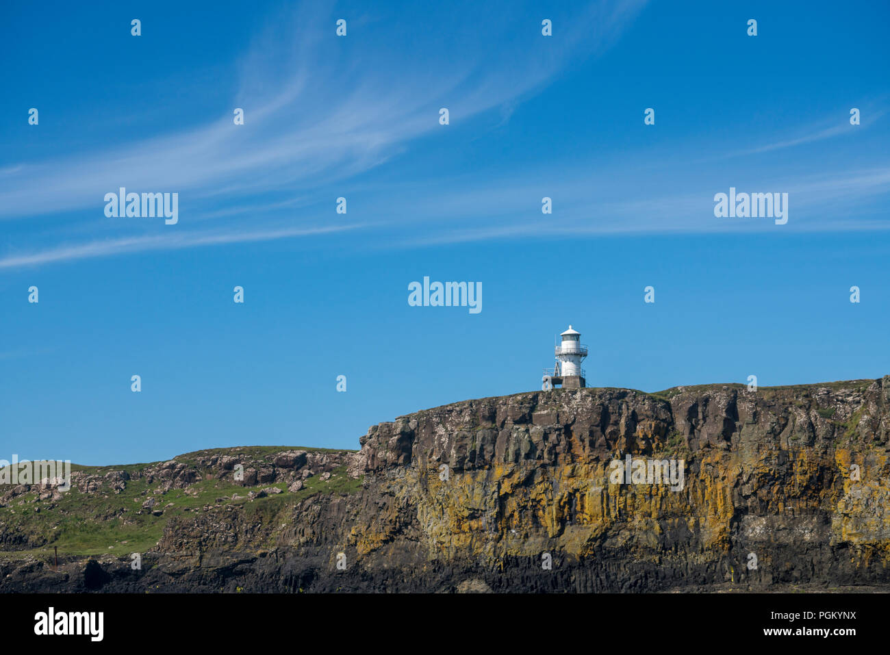 A small lighthouse on the island of Canna. Canna is the westernmost of ...