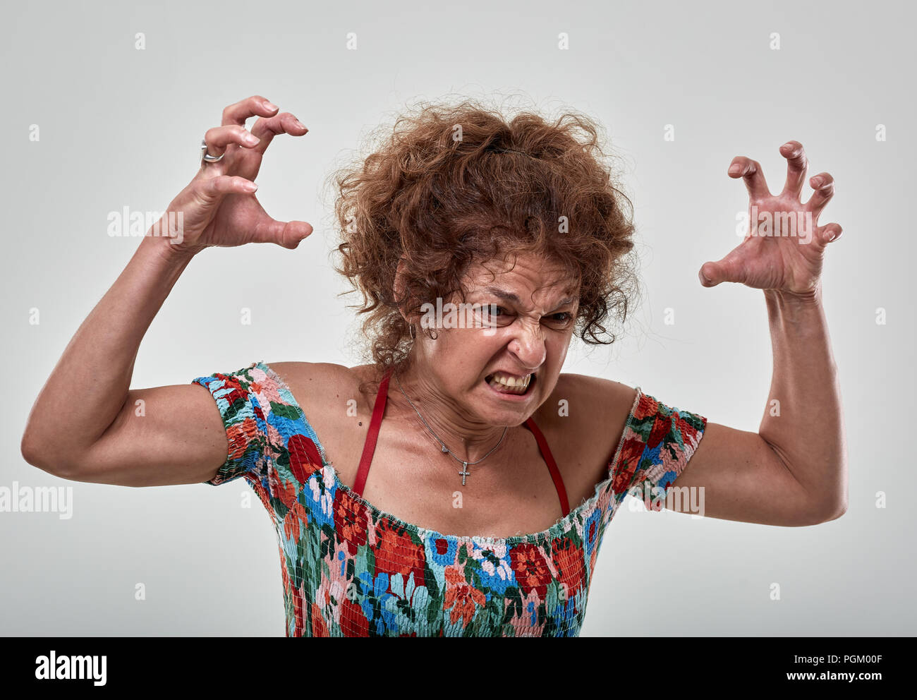 Portrait of a very angry mature woman Stock Photo - Alamy