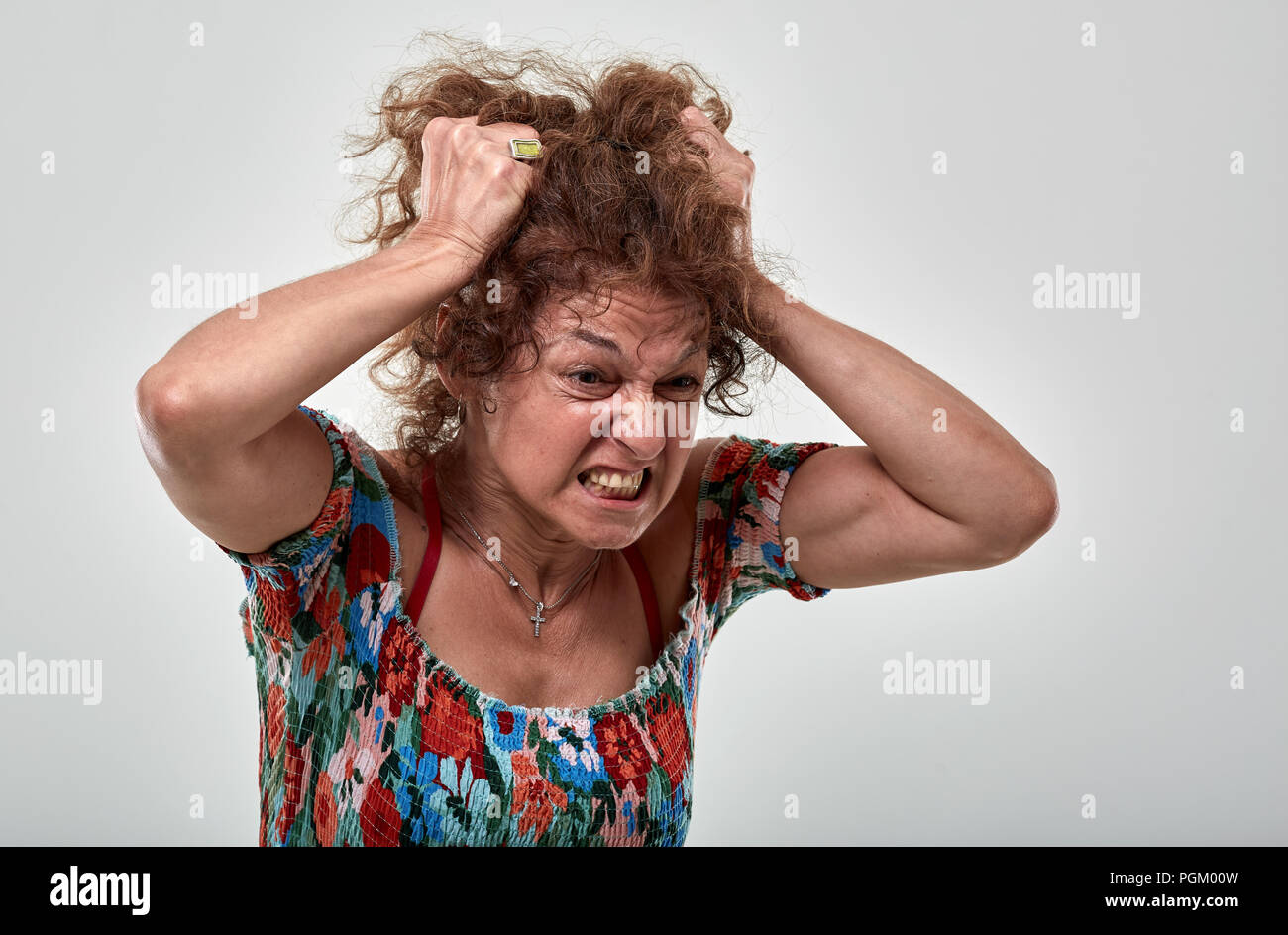 Portrait of a very angry mature woman Stock Photo - Alamy