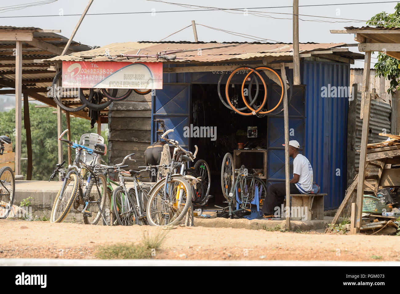 CENTRAL REGION, GHANA - Jan 17, 2017: Unidentified Ghanaian man sits on ...