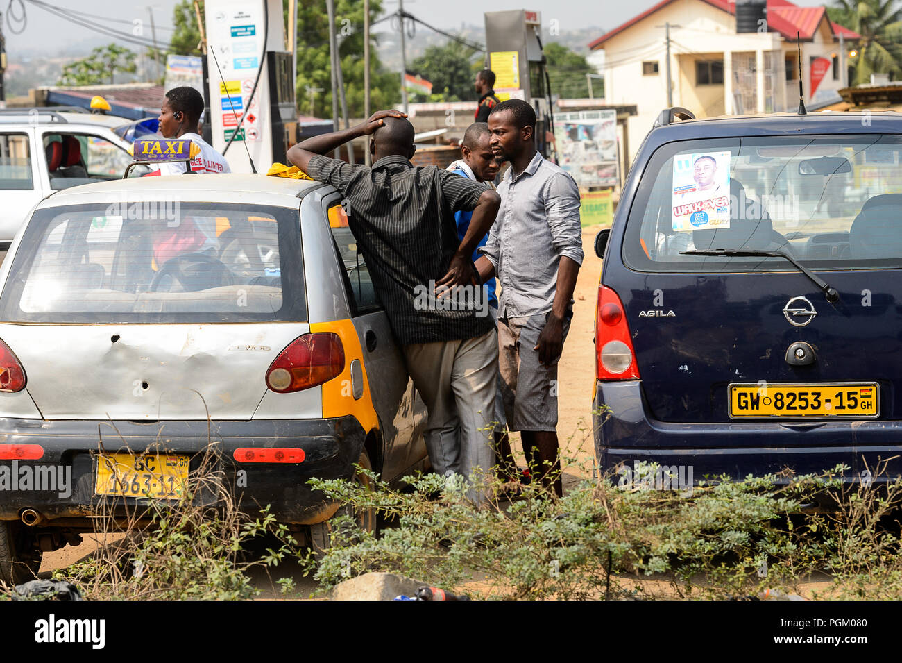 CENTRAL REGION, GHANA - Jan 17, 2017: Unidentified Ghanaian men stand ...