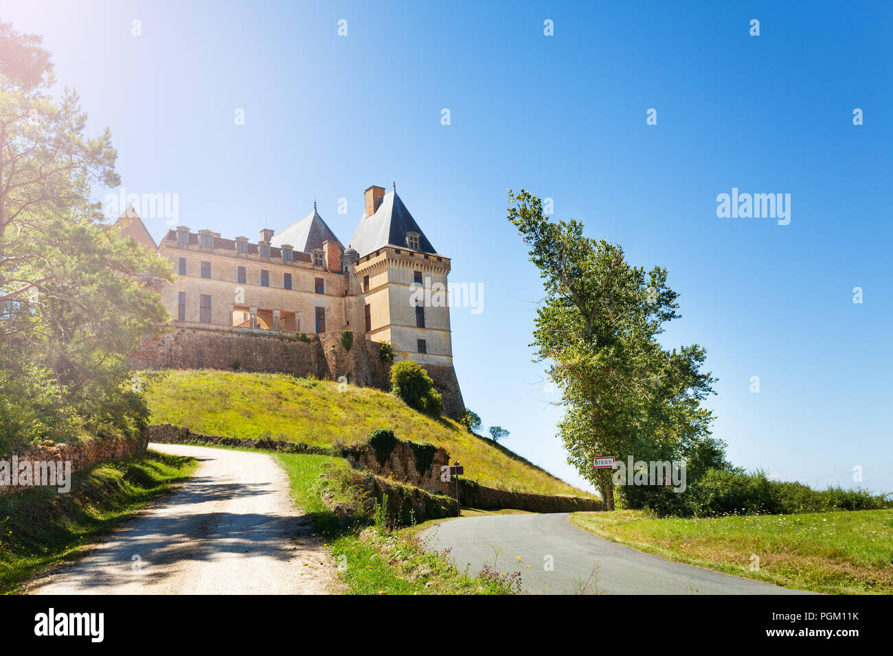 Road to the Chateau de Biron castle in France Stock Photo - Alamy