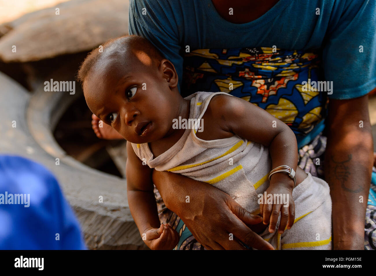 PIRA, BENIN - JAN 12, 2017: Unidentified Beninese little baby is ...