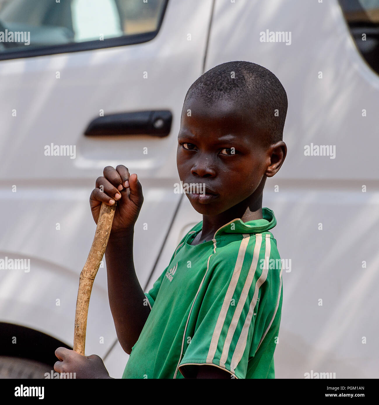 PIRA, BENIN - JAN 12, 2017: Unidentified Beninese little boy in green ...
