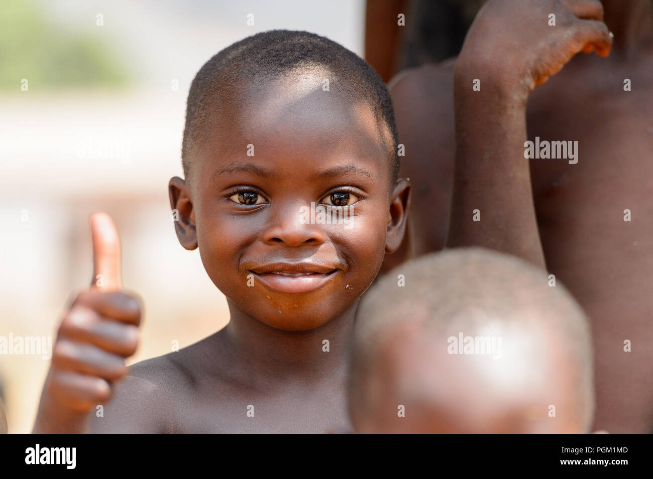 PIRA, BENIN - JAN 12, 2017: Unidentified Beninese little boy with ...