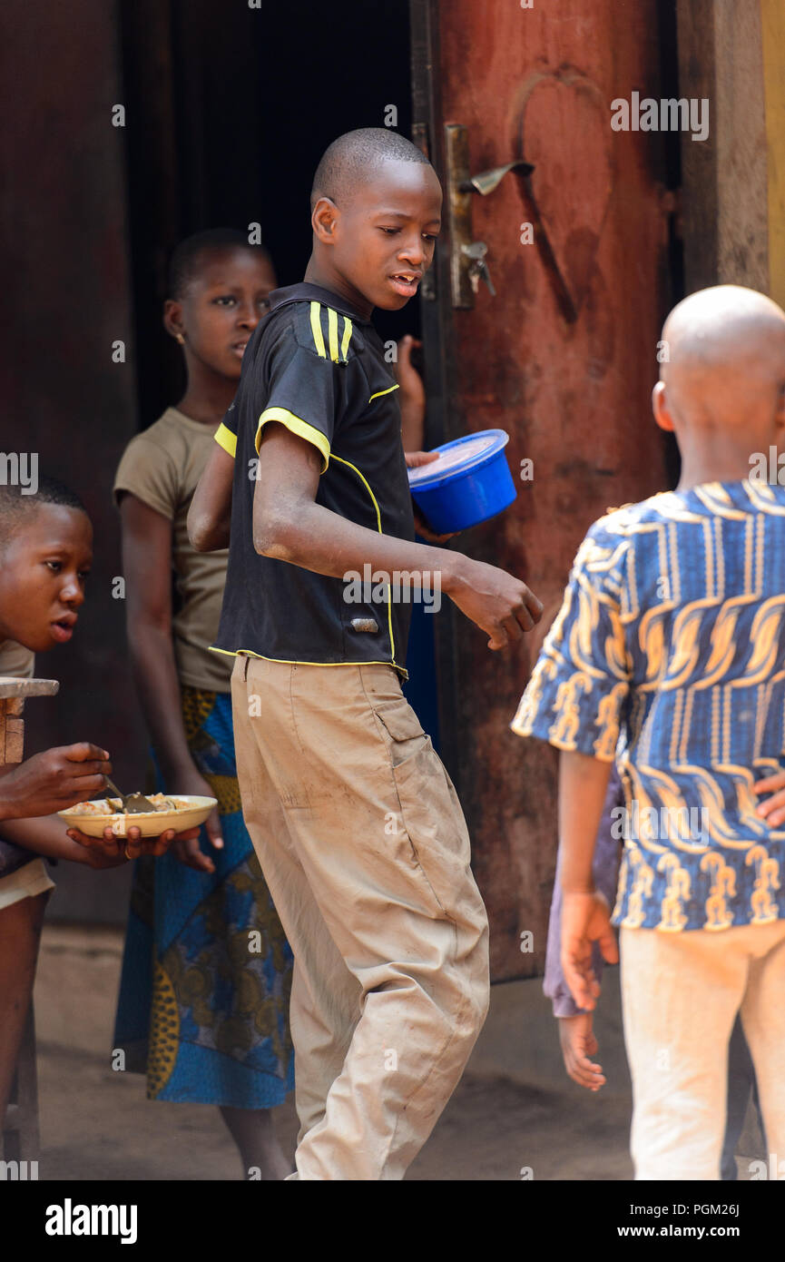 PIRA, BENIN - JAN 12, 2017: Unidentified Beninese boys in colored ...