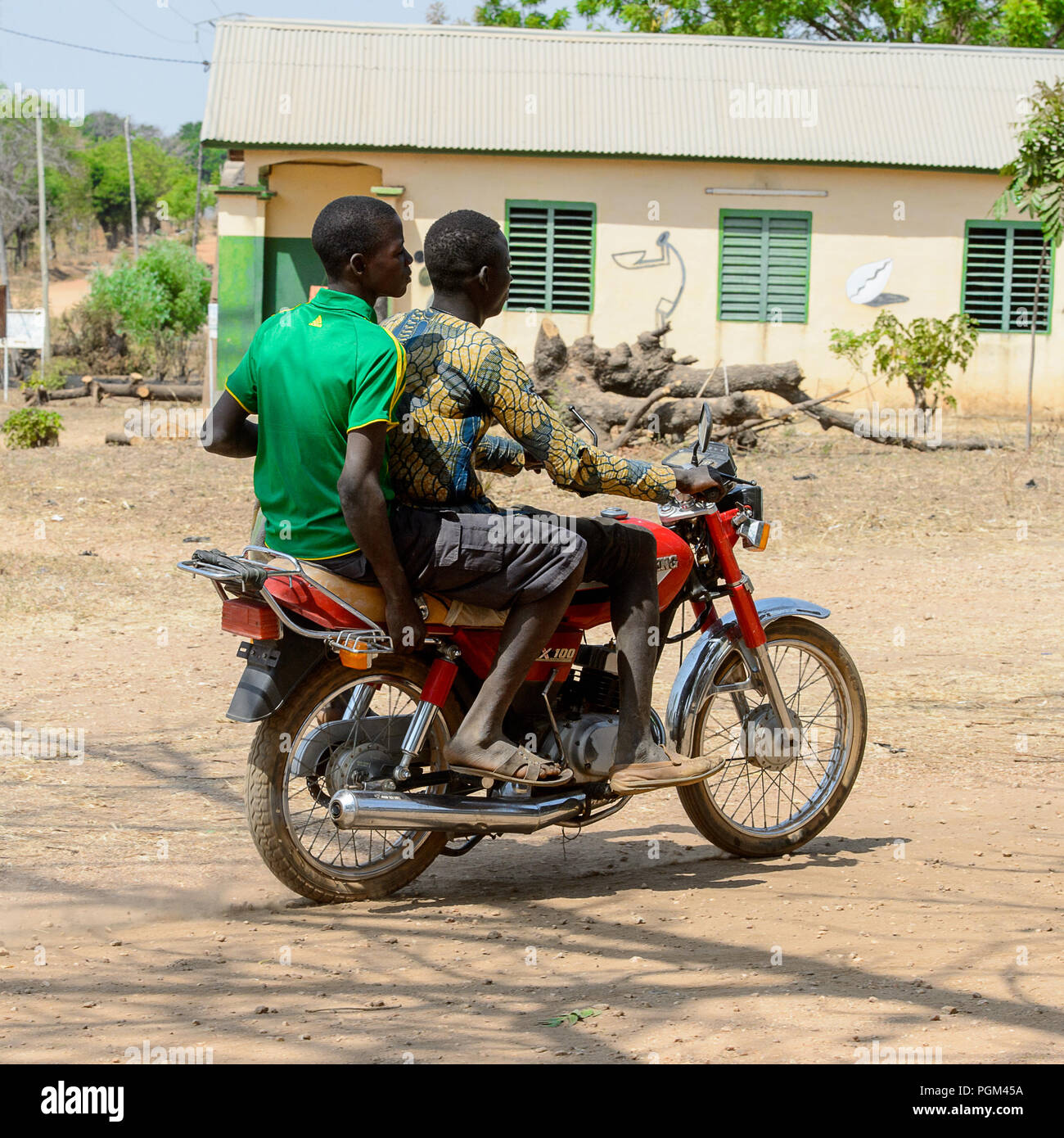 KOUTAMMAKOU, TOGO - JAN 13, 2017: Unidentified Togolese man rides a ...