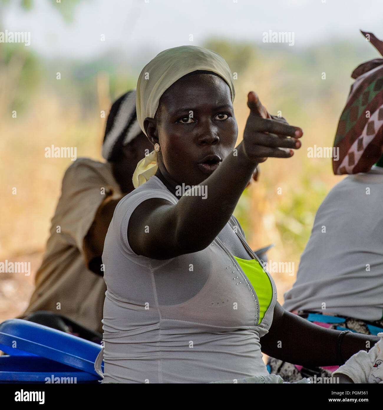 KOUTAMMAKOU, TOGO - JAN 13, 2017: Unidentified Togolese woman points on ...