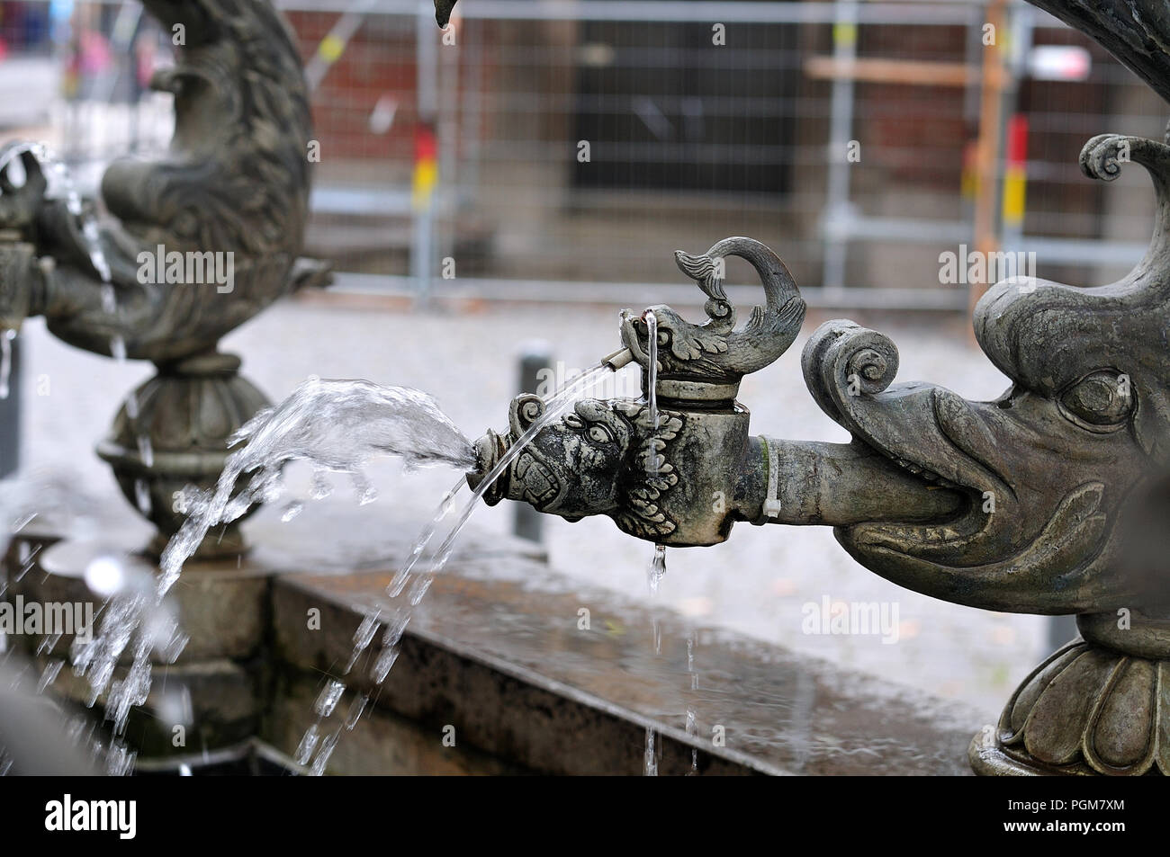 bronze fantasy fishes at fountain of 16th century in city of Ulm ...